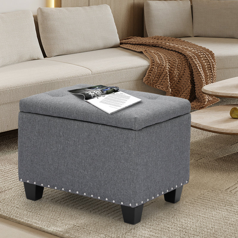 Buttoned footstool with storage store